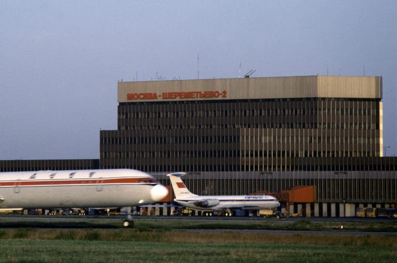 Long haul action at Sheremetyevo; an Aeroflot Il-62M rests between ...